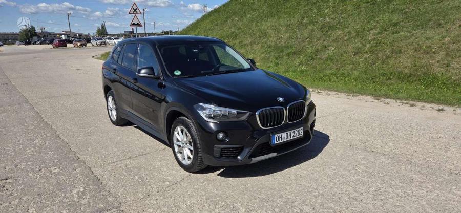 Black BMW X1 2017 in Vilnius, with an engine capacity of 1.50 L and mileage of 218 thousand km for 10950 €, photo 1 on AUTOMOTO.COM.LV