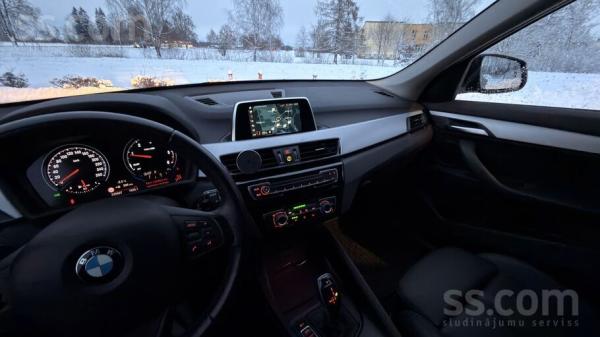 Black BMW X1 2018 in Riga, with an engine capacity of 2.00 L and mileage of 232 thousand km for 16000 €, photo 7 on AUTOMOTO.COM.LV