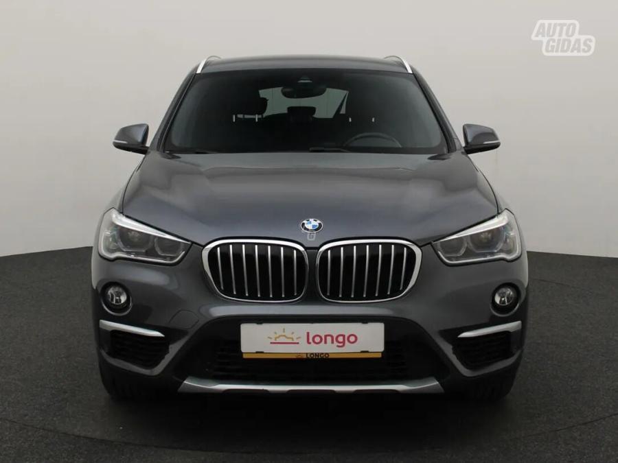 Black BMW X1 2018 in Vilnius, with an engine capacity of 2.00 L and mileage of 154 thousand km for 16999 €, photo 4 on AUTOMOTO.COM.LV