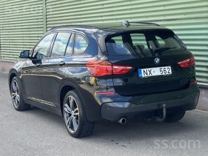 Black BMW X1 2018 in Riga, with an engine capacity of 1.50 L and mileage of 146 thousand km for 15500 €, photo 8 on AUTOMOTO.COM.LV