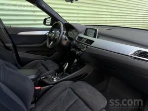 Black BMW X1 2018 in Riga, with an engine capacity of 1.50 L and mileage of 146 thousand km for 15500 €, photo 16 on AUTOMOTO.COM.LV