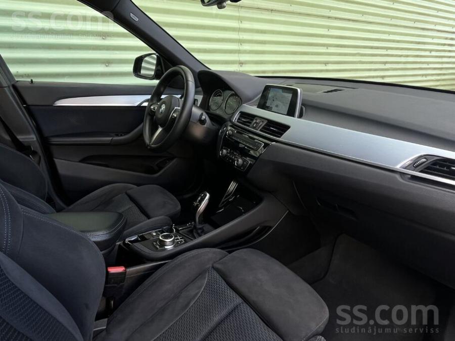 Black BMW X1 2018 in Riga, with an engine capacity of 1.50 L and mileage of 146 thousand km for 15500 €, photo 16 on AUTOMOTO.COM.LV