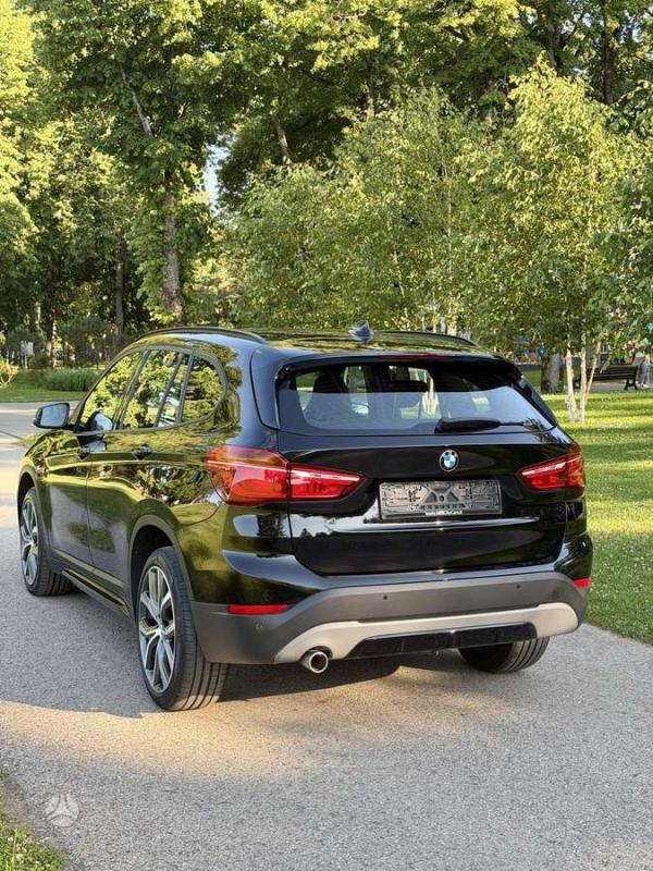 Black BMW X1 2018 in Birstonas, with an engine capacity of 2.00 L and mileage of 253 thousand km for 11850 €, photo 7 on AUTOMOTO.COM.LV