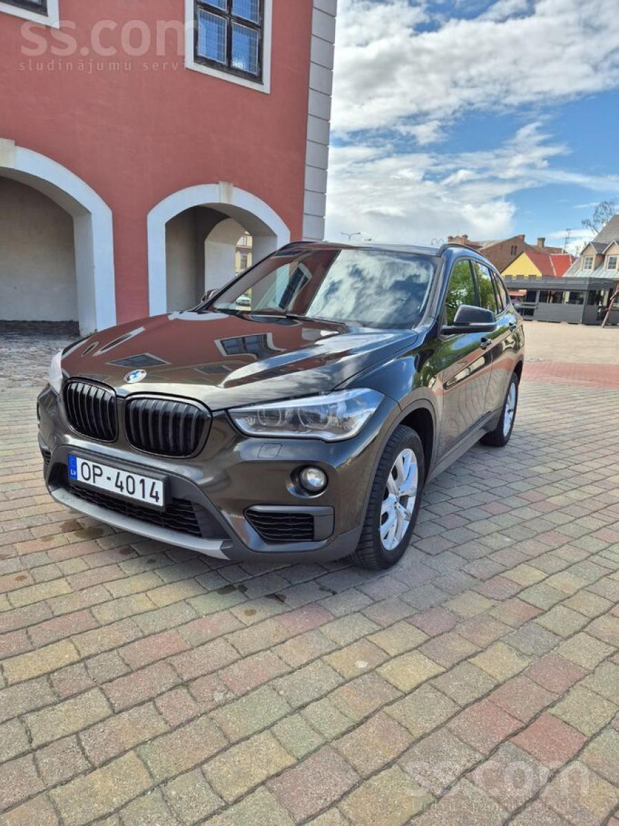 Black BMW X1 2018 in Bauska, with an engine capacity of 2.00 L and mileage of 241 thousand km for 13400 €, photo 1 on AUTOMOTO.COM.LV