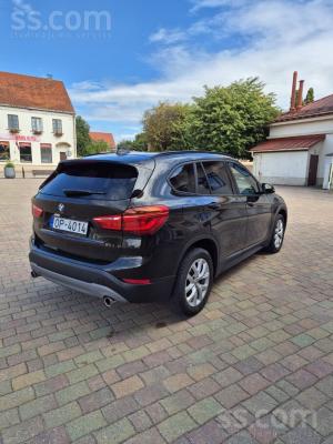 Black BMW X1 2018 in Bauska, with an engine capacity of 2.00 L and mileage of 241 thousand km for 13400 €, photo 5 on AUTOMOTO.COM.LV
