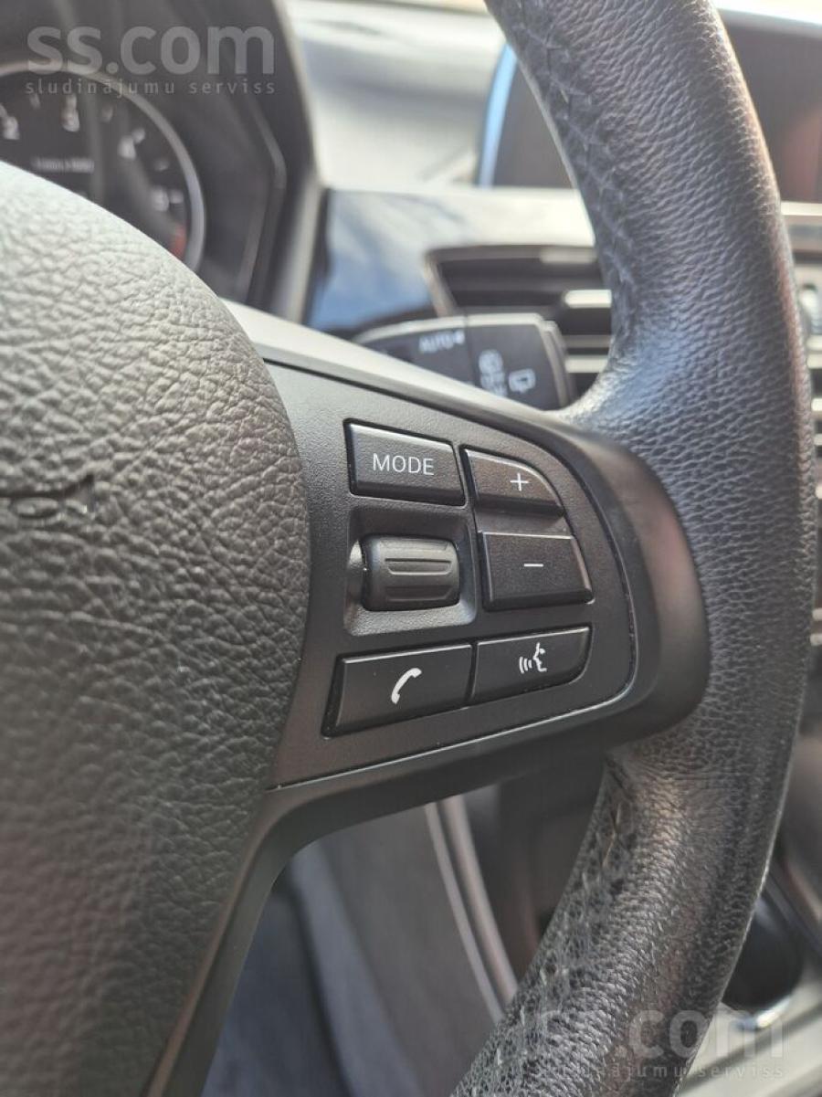 Black BMW X1 2018 in Bauska, with an engine capacity of 2.00 L and mileage of 241 thousand km for 13400 €, photo 14 on AUTOMOTO.COM.LV