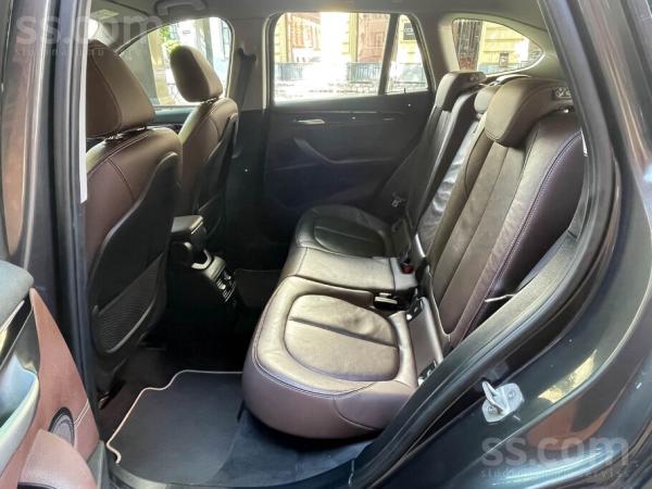 Black BMW X1 2019 in Riga, with an engine capacity of 2.00 L and mileage of 230 thousand km for 10000 €, photo 8 on AUTOMOTO.COM.LV