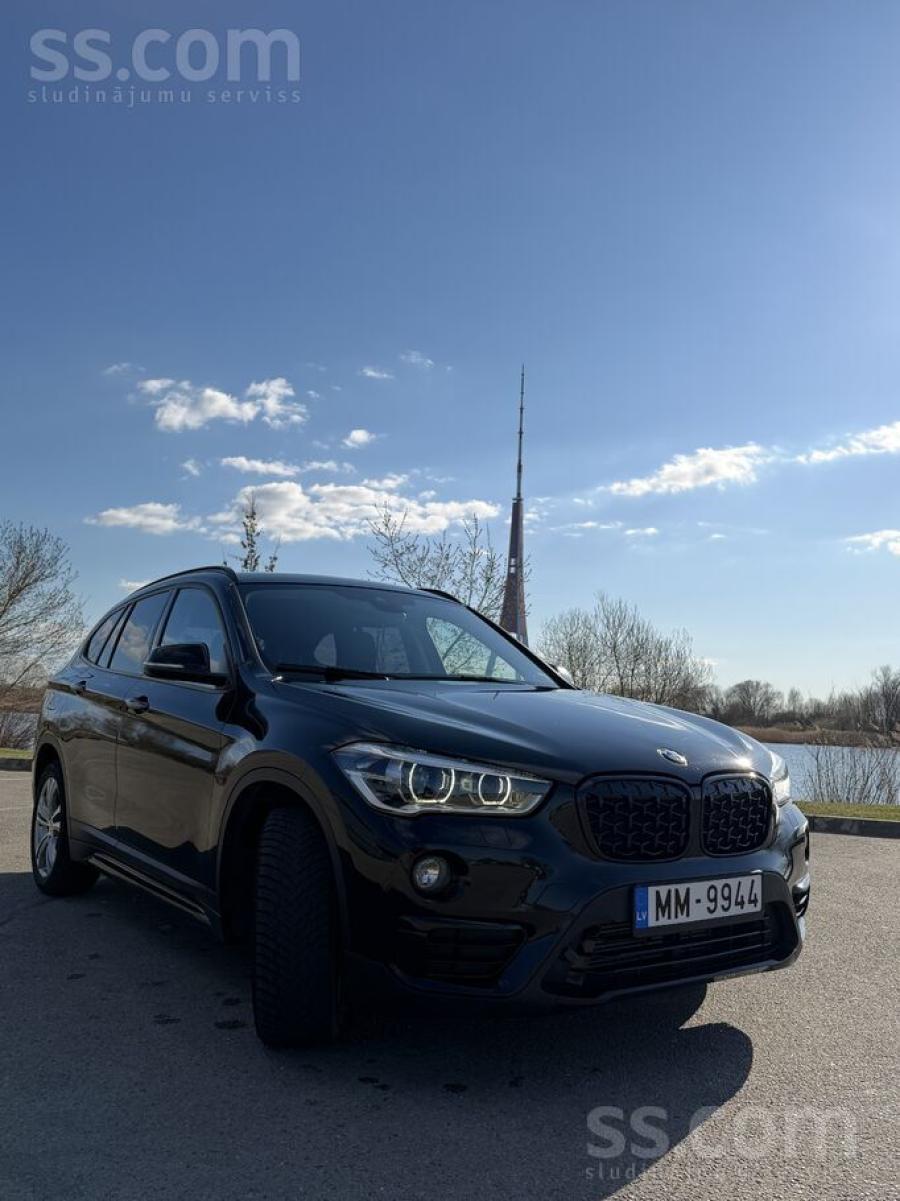 Black BMW X1 2019 in Riga, with an engine capacity of 2.00 L and mileage of 169 thousand km for 17100 €, photo 1 on AUTOMOTO.COM.LV