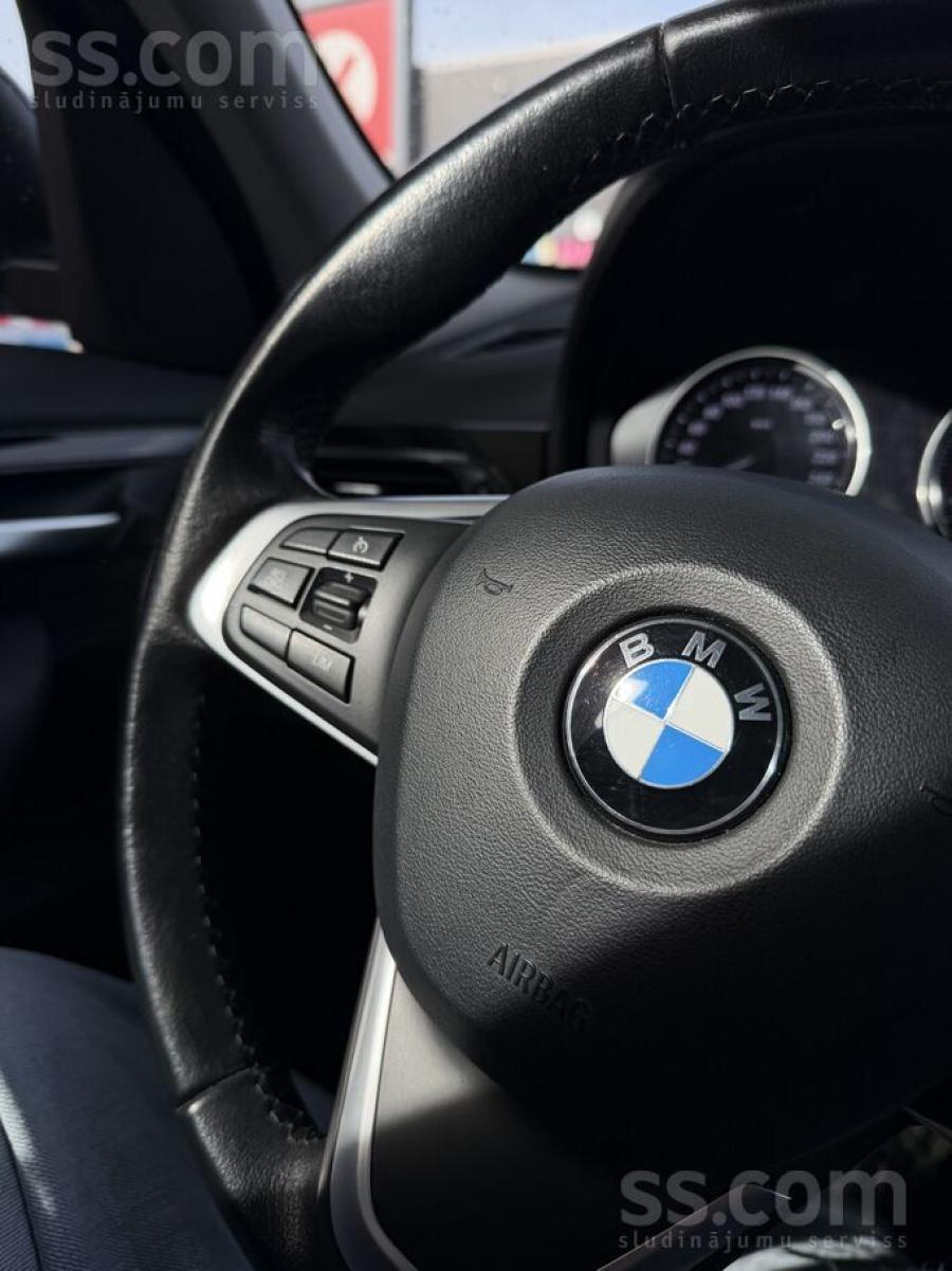 Black BMW X1 2019 in Riga, with an engine capacity of 2.00 L and mileage of 169 thousand km for 17100 €, photo 7 on AUTOMOTO.COM.LV