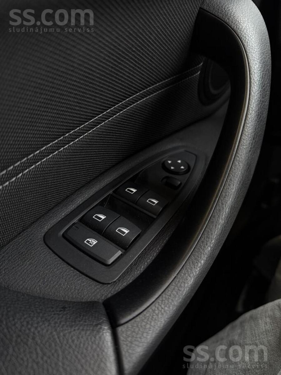 Black BMW X1 2019 in Riga, with an engine capacity of 2.00 L and mileage of 169 thousand km for 17100 €, photo 8 on AUTOMOTO.COM.LV