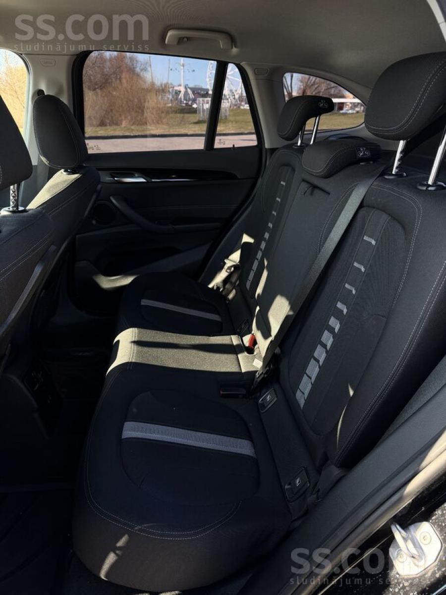 Black BMW X1 2019 in Riga, with an engine capacity of 2.00 L and mileage of 169 thousand km for 17100 €, photo 9 on AUTOMOTO.COM.LV