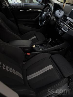 Black BMW X1 2019 in Riga, with an engine capacity of 2.00 L and mileage of 169 thousand km for 17100 €, photo 15 on AUTOMOTO.COM.LV