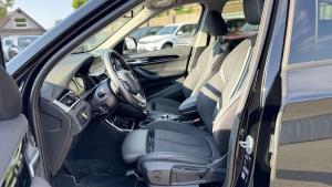 Black BMW X1 2019 in Telschi, with an engine capacity of 2.00 L and mileage of 156 thousand km for 15800 €, photo 14 on AUTOMOTO.COM.LV