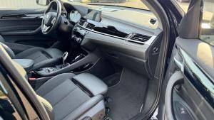 Black BMW X1 2019 in Telschi, with an engine capacity of 2.00 L and mileage of 156 thousand km for 15800 €, photo 16 on AUTOMOTO.COM.LV