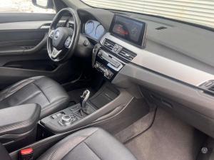 Black BMW X1 2020 in Vilnius, with an engine capacity of 2.00 L and mileage of 135 thousand km for 21417 €, photo 12 on AUTOMOTO.COM.LV
