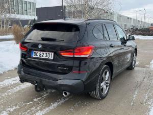 Black BMW X1 2021 in Vilnius, with an engine capacity of 2.00 L and mileage of 198 thousand km for 19500 €, photo 6 on AUTOMOTO.COM.LV