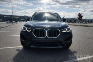 Black BMW X1 2021 in Riga, with an engine capacity of 1.50 L and mileage of 89 thousand km for 21500 €, photo 6 on AUTOMOTO.COM.LV