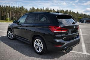 Black BMW X1 2021 in Riga, with an engine capacity of 1.50 L and mileage of 89 thousand km for 21500 €, photo 9 on AUTOMOTO.COM.LV