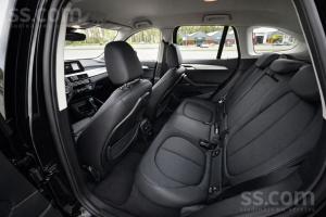 Black BMW X1 2021 in Riga, with an engine capacity of 1.50 L and mileage of 89 thousand km for 21500 €, photo 13 on AUTOMOTO.COM.LV