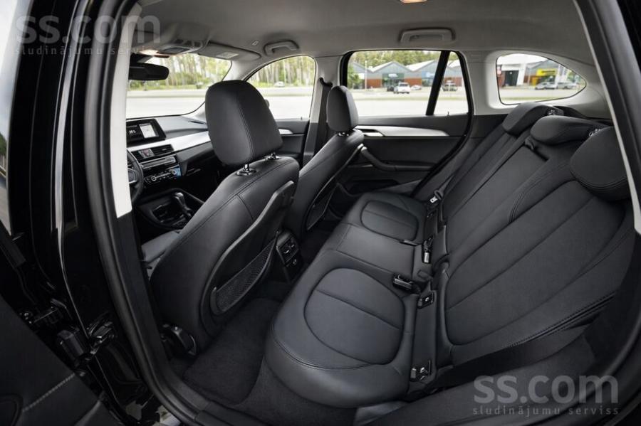 Black BMW X1 2021 in Riga, with an engine capacity of 1.50 L and mileage of 89 thousand km for 21500 €, photo 13 on AUTOMOTO.COM.LV
