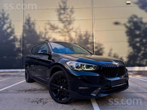 Black BMW X1 2021 in Riga, with an engine capacity of 2.00 L and mileage of 280 thousand km for 16999 €, photo 2 on AUTOMOTO.COM.LV