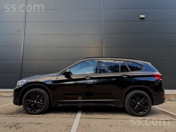Black BMW X1 2021 in Riga, with an engine capacity of 2.00 L and mileage of 280 thousand km for 16999 €, photo 3 on AUTOMOTO.COM.LV
