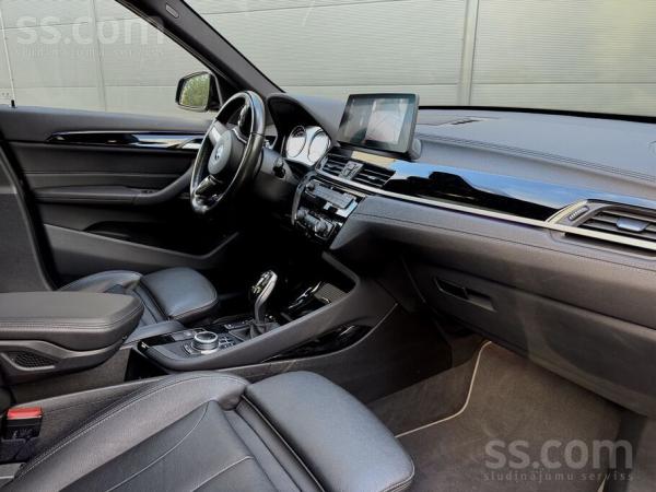 Black BMW X1 2021 in Riga, with an engine capacity of 2.00 L and mileage of 280 thousand km for 16999 €, photo 10 on AUTOMOTO.COM.LV
