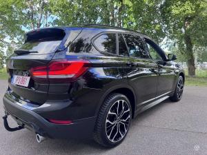 Black BMW X1 2021 in Alytus, with an engine capacity of 2.00 L and mileage of 339 thousand km for 13350 €, photo 14 on AUTOMOTO.COM.LV