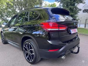 Black BMW X1 2021 in Alytus, with an engine capacity of 2.00 L and mileage of 339 thousand km for 13350 €, photo 15 on AUTOMOTO.COM.LV