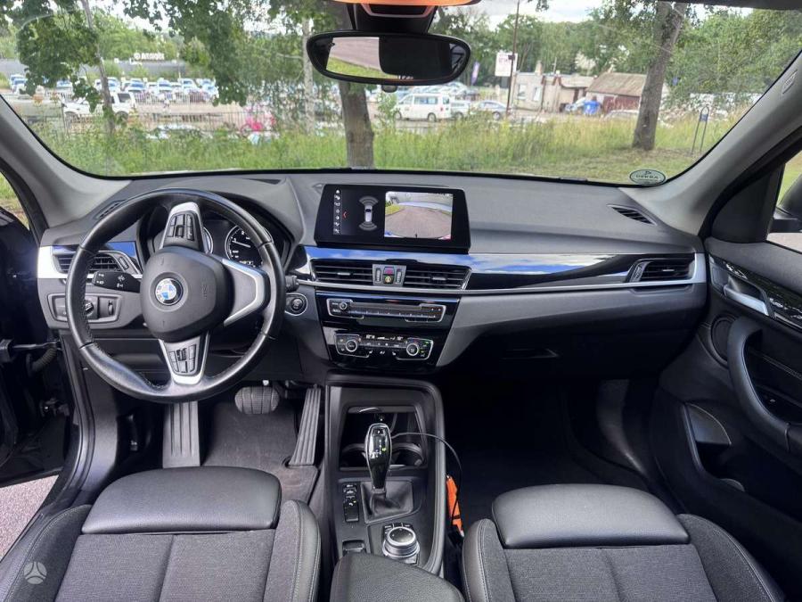 Black BMW X1 2021 in Alytus, with an engine capacity of 2.00 L and mileage of 339 thousand km for 13350 €, photo 16 on AUTOMOTO.COM.LV