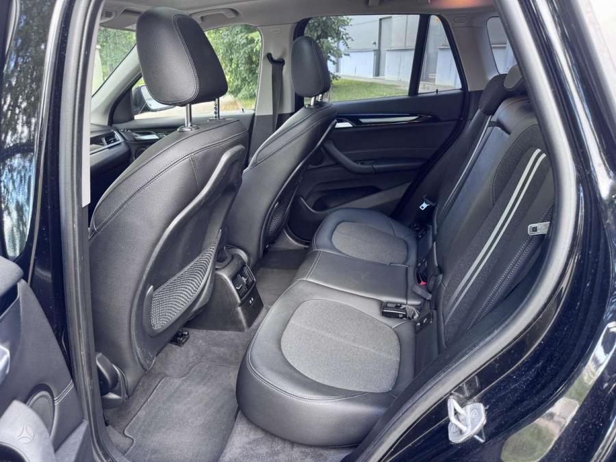 Black BMW X1 2021 in Alytus, with an engine capacity of 2.00 L and mileage of 339 thousand km for 13350 €, photo 18 on AUTOMOTO.COM.LV