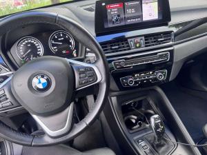 Black BMW X1 2021 in Alytus, with an engine capacity of 2.00 L and mileage of 339 thousand km for 13350 €, photo 19 on AUTOMOTO.COM.LV
