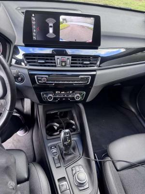 Black BMW X1 2021 in Alytus, with an engine capacity of 2.00 L and mileage of 339 thousand km for 13350 €, photo 21 on AUTOMOTO.COM.LV