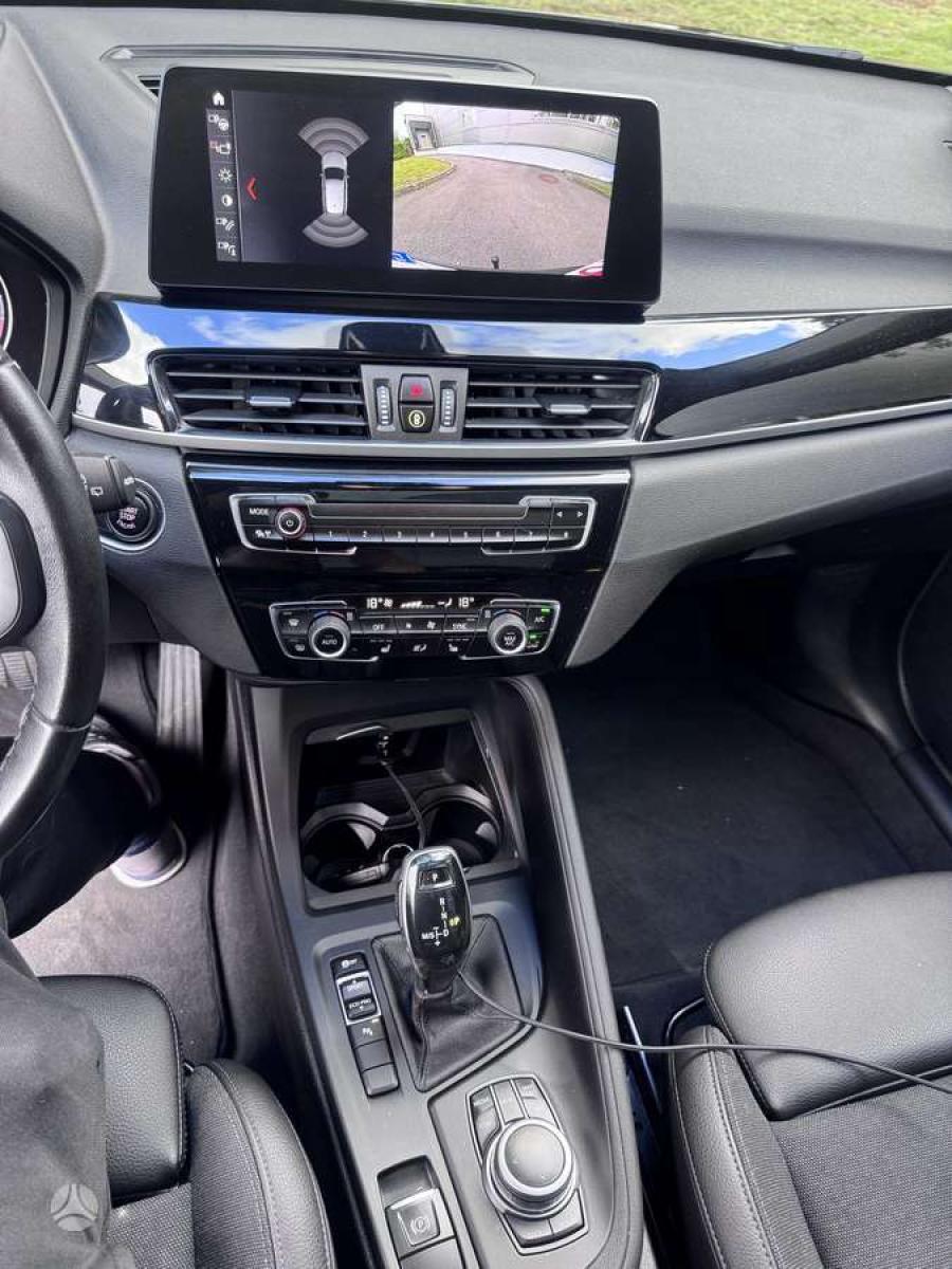 Black BMW X1 2021 in Alytus, with an engine capacity of 2.00 L and mileage of 339 thousand km for 13350 €, photo 21 on AUTOMOTO.COM.LV