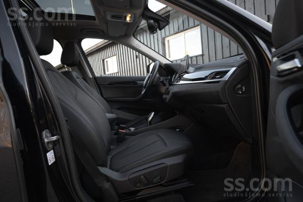 Black BMW X1 2022 in Jelgava, with an engine capacity of 2.00 L and mileage of 175 thousand km for 19500 €, photo 9 on AUTOMOTO.COM.LV