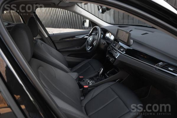 Black BMW X1 2022 in Jelgava, with an engine capacity of 2.00 L and mileage of 175 thousand km for 19500 €, photo 10 on AUTOMOTO.COM.LV