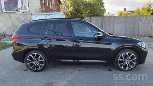 Black BMW X1 2022 in Liepaja, with an engine capacity of 2.00 L and mileage of 216 thousand km for 19990 €, photo 5 on AUTOMOTO.COM.LV