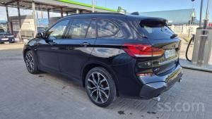 Black BMW X1 2022 in Liepaja, with an engine capacity of 2.00 L and mileage of 216 thousand km for 19990 €, photo 8 on AUTOMOTO.COM.LV