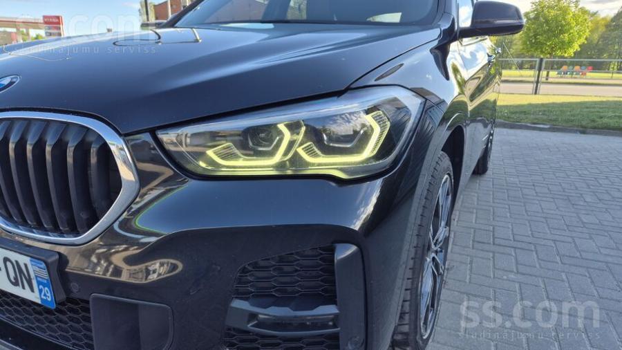 Black BMW X1 2022 in Liepaja, with an engine capacity of 2.00 L and mileage of 216 thousand km for 19990 €, photo 12 on AUTOMOTO.COM.LV