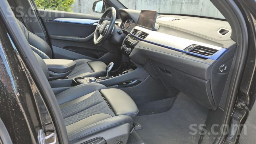 Black BMW X1 2022 in Liepaja, with an engine capacity of 2.00 L and mileage of 216 thousand km for 19990 €, photo 13 on AUTOMOTO.COM.LV