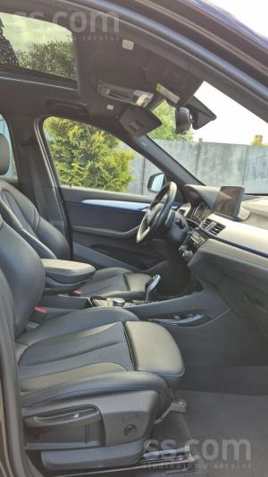 Black BMW X1 2022 in Liepaja, with an engine capacity of 2.00 L and mileage of 216 thousand km for 19990 €, photo 14 on AUTOMOTO.COM.LV