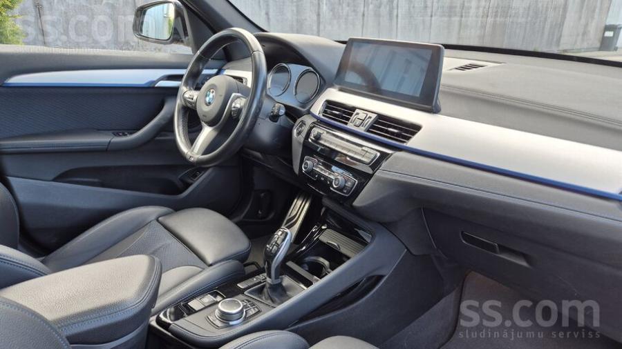 Black BMW X1 2022 in Liepaja, with an engine capacity of 2.00 L and mileage of 216 thousand km for 19990 €, photo 15 on AUTOMOTO.COM.LV