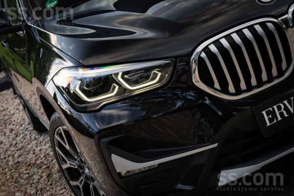 Black BMW X1 2022 in Jelgava, with an engine capacity of 2.00 L and mileage of 206 thousand km for 19500 €, photo 7 on AUTOMOTO.COM.LV