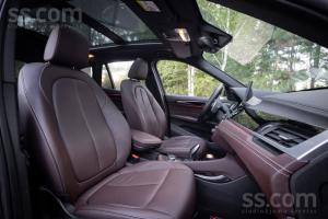 Black BMW X1 2022 in Jelgava, with an engine capacity of 2.00 L and mileage of 206 thousand km for 19500 €, photo 11 on AUTOMOTO.COM.LV