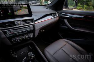 Black BMW X1 2022 in Jelgava, with an engine capacity of 2.00 L and mileage of 206 thousand km for 19500 €, photo 14 on AUTOMOTO.COM.LV