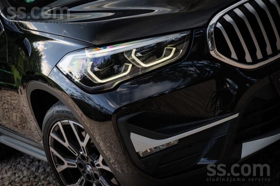 Black BMW X1 2022 in Jelgava, with an engine capacity of 2.00 L and mileage of 206 thousand km for 19500 €, photo 30 on AUTOMOTO.COM.LV