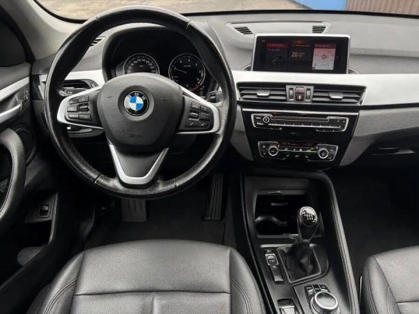 Black BMW X1 2022 in Riga, with an engine capacity of 2.00 L and mileage of 200 thousand km for 14950 €, photo 7 on AUTOMOTO.COM.LV