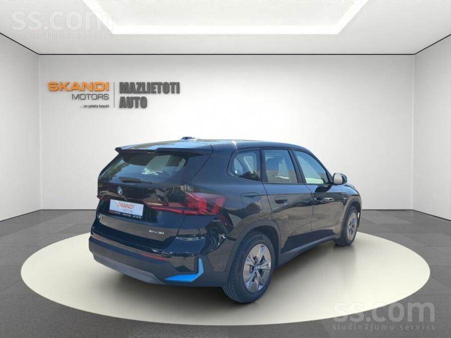 Black BMW X1 2023 in Riga, with an engine capacity of 0.00 L and mileage of 49 thousand km for 34990 €, photo 7 on AUTOMOTO.COM.LV