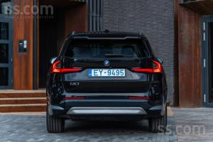 Black BMW X1 2023 in Riga, with an engine capacity of 0.00 L and mileage of 48 thousand km for 38900 €, photo 7 on AUTOMOTO.COM.LV