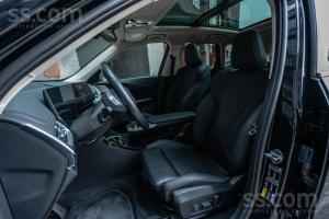 Black BMW X1 2023 in Riga, with an engine capacity of 0.00 L and mileage of 48 thousand km for 38900 €, photo 18 on AUTOMOTO.COM.LV